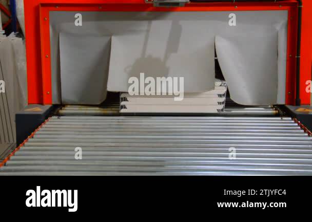 The metal sheets coming out of the drying oven are used in the ...