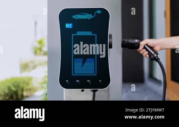 Home electric charging station showing battery status interface on ...