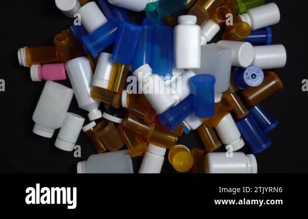 Many prescription drugs and pills bottles. Pharmaceutical generic drugs ...