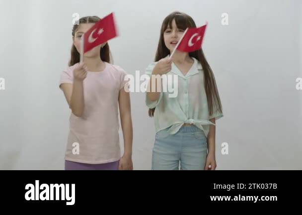 Smiling little girls isolated on white background celebrating with ...