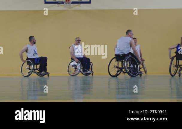 Wheelchair Basketball Game: Players Compete, Dribbling Ball, Passing ...