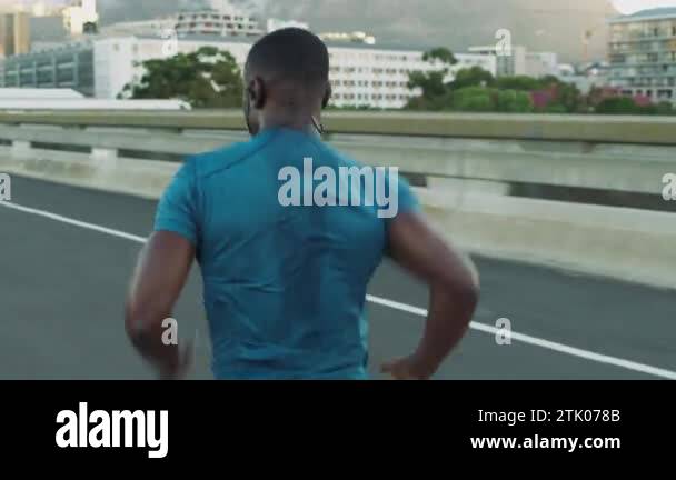 City, fitness or black man running on road in cardio training, workout ...