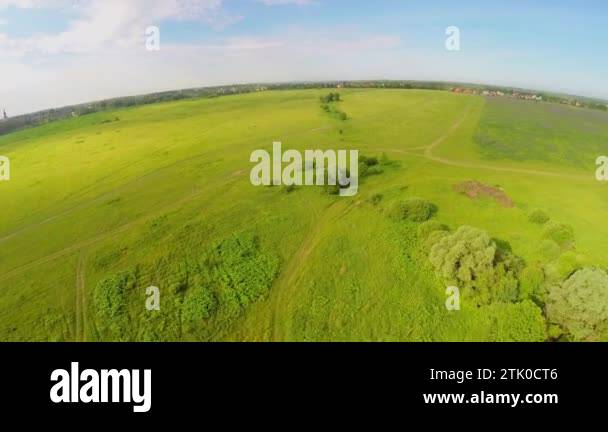 Field near village Stock Videos & Footage - HD and 4K Video Clips - Alamy