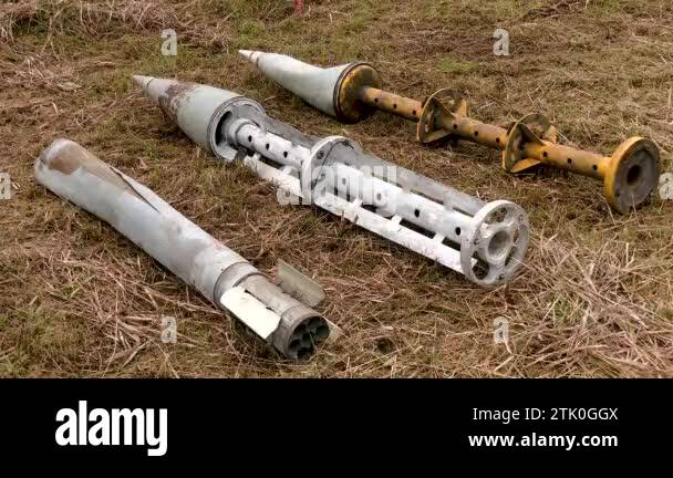 Remnants of cluster munitions on the ground. Clearance of unexploded ...