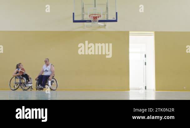 Wheelchair Basketball Game: Players Compete, Dribbling Ball, Passing ...