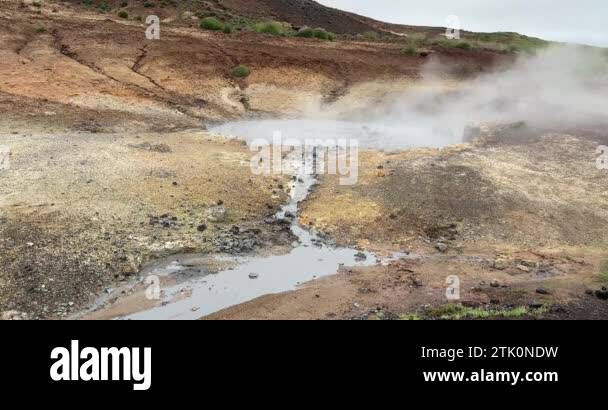 Steam from a dangerous hot spring at the Seltun Geothermal Area on the ...