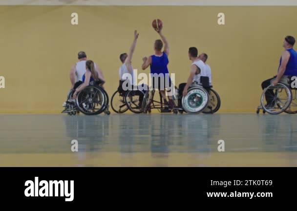 Wheelchair Basketball Game: Players Compete, Dribbling Ball, Passing ...