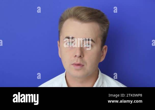 Amazed european man shocked, saying WOW. Handsome guy with stylish ...