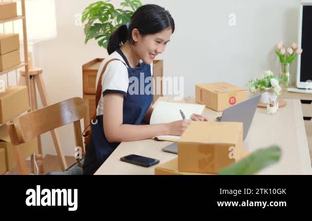 A portrait of a small start-up and SME owner, an Asian female ...