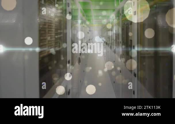 Animation of illuminated lens flares and computer language moving over ...