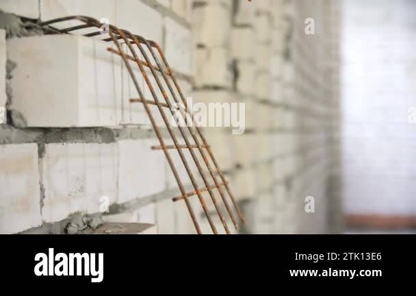 Reinforced masonry to strengthen floor and wall slabs. Process of ...