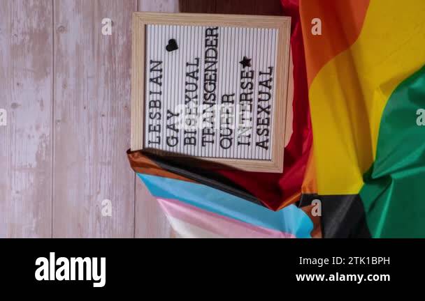 Vertical Zoom in out LGBTQIA description frame on Rainbow LGBTQIA flag ...