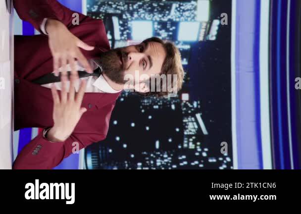 Vertical video Night show presenter opens media segment on live program ...