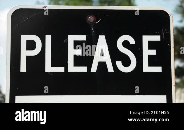please caption writing word text metal sign in white capital letters on ...