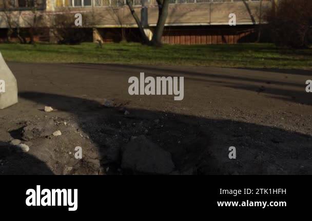 Consequences of rocket attack on the center of Ukraine. Funnel from a ...