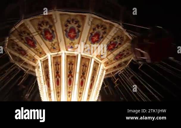 swinging carousel, night illumination, amusement park, This is a ...