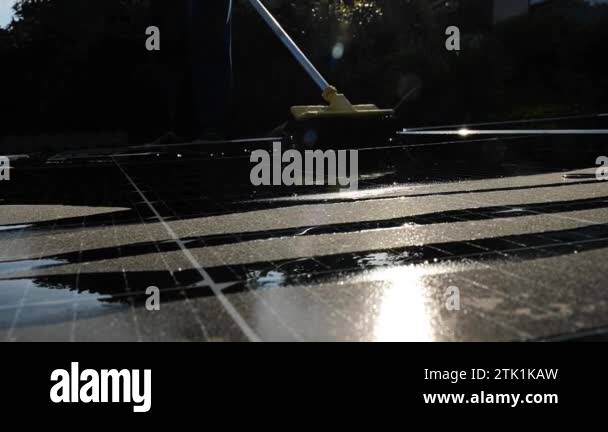 Cleaning solar panels from dust and dirt with water.solar power ...