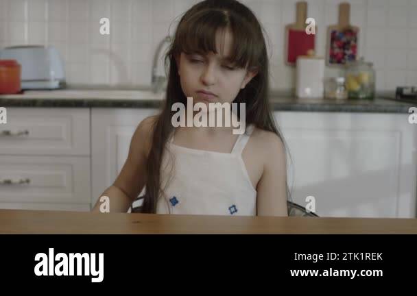 Little girl angry, angry and disobedient at bad behavior showing middle ...