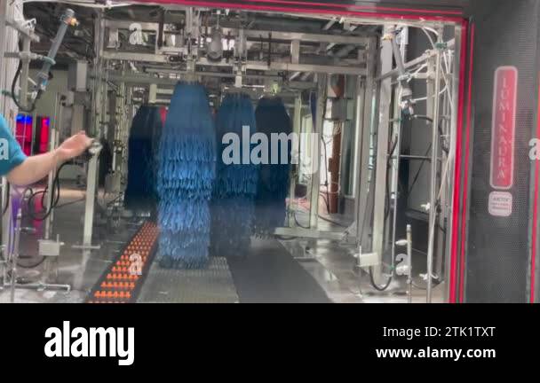 The car moves through an automatic car wash. View of the car wash ...