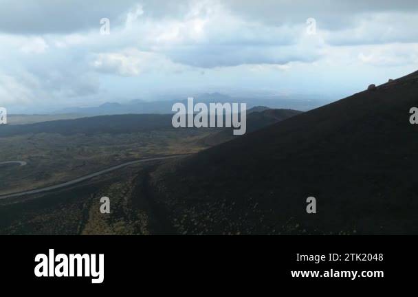 Panoramic aerial wide view of the active volcano Etna, extinct craters ...