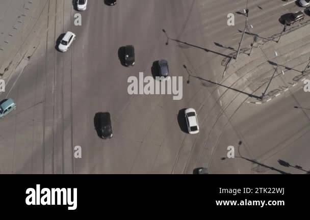 Traffic cars at a big intersection - high angle view. Traffic at an ...