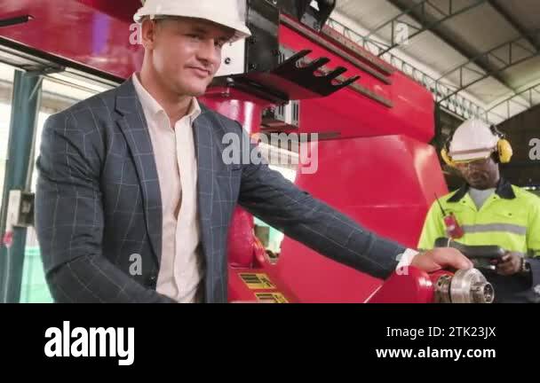 White male entrepreneur is proud successful with robotic arm, thumbs up ...