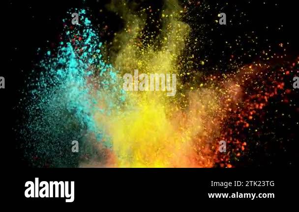 Super slow motion of colored powder explosion isolated on black ...