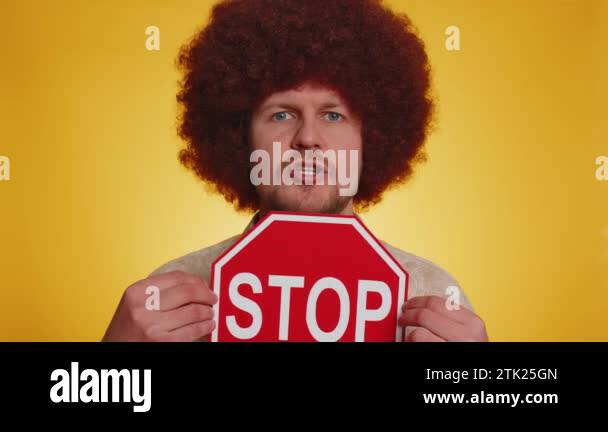 No stop. Serious man say No, hold inscription text red No stop danger ...