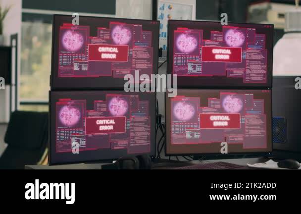 Empty Office With Multiple Monitors Showing Hacking Attack Alert It