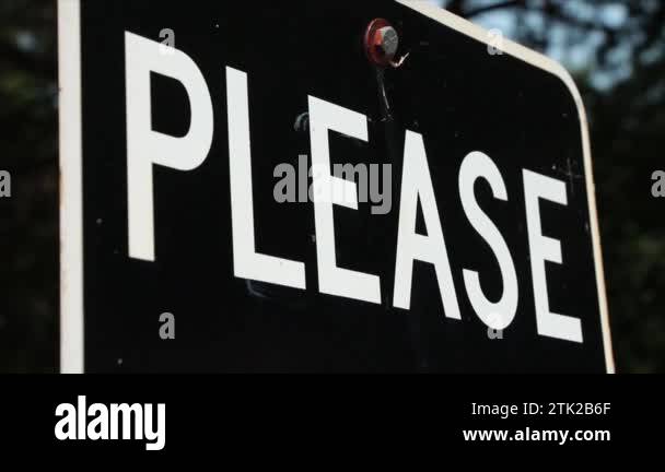 please caption writing word text metal sign in white capital letters on ...