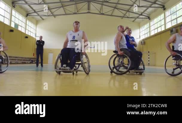 Wheelchair Basketball Game: Players Compete, Dribbling Ball, Passing ...