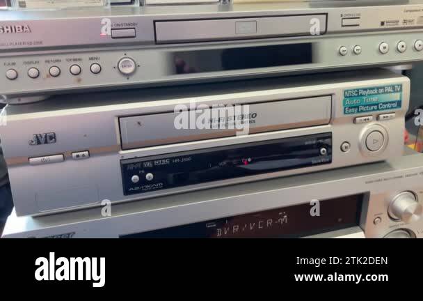 stack of hifi devices with amplifier, CD-Player, VHS-recorder. High ...