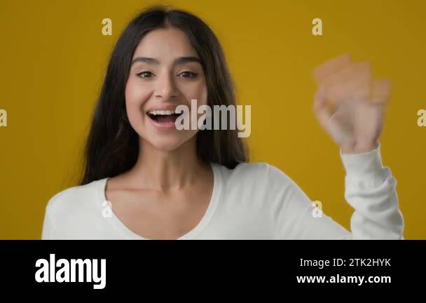 Female portrait in yellow studio background Indian ethnic woman lady ...