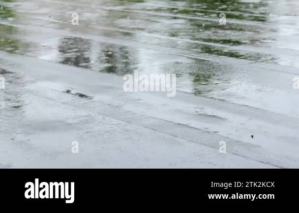 Raindrops knock on the roof, heavy rain, downpour. The flat roof of the ...