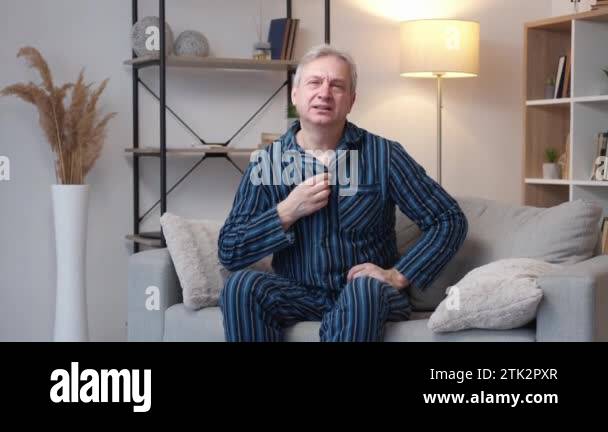 Heart attack. Aged man. Health problem. Shocked elder male in pajamas ...