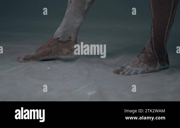 Mans feet in tension, lifting on the toes, trailing toes. Male feet in ...
