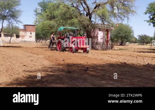 07 January 2023 Jaipur, Rajasthan, India. Softening the soil and ...