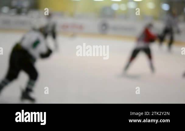 Blurred background. Teams of hockey players playing hockey. Teenage ...