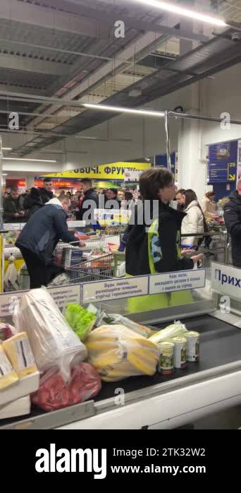 people in the supermarket at the checkout Customers in supermarket ...