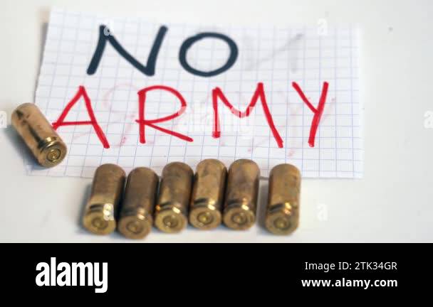 No Army and no war logo sign with 9 mm revolver gun bullets - peace ...