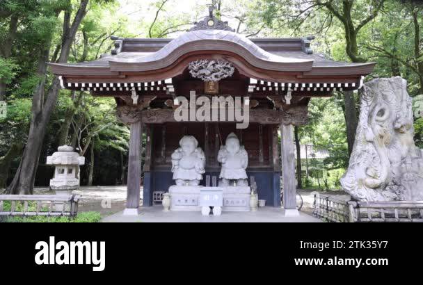 Japanese guardian statues at the traditional street in Tokyo. High ...
