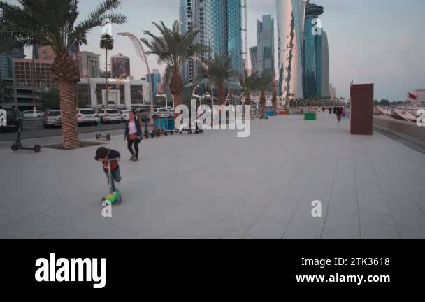 Doha corniche in Doha, Qatar zooming in sunset shot showing the ...