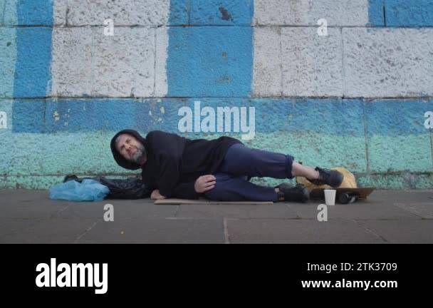 Poor man sitting Stock Videos & Footage - HD and 4K Video Clips - Alamy