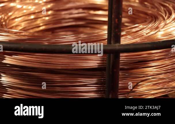 Wire coiling, cable making, copper industry. In industrial setting ...