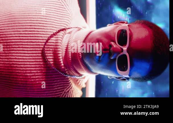 Vertical video. Cyber people. Digital art. Synthwave party. Red blue ...