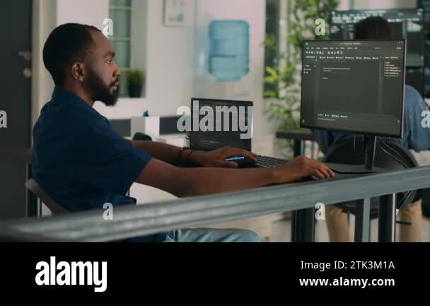 African American Coder Developing App Interface With Html Code And Script On Terminal Window