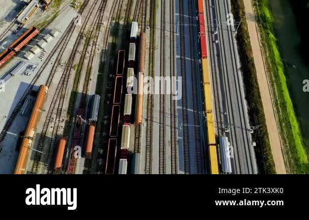 Cargo trains close-up. Aerial view of colorful freight trains on the ...