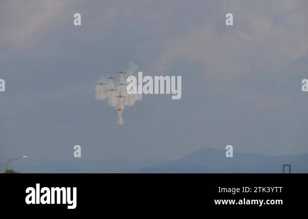 Ghedi Italy SEPTEMBER, 8, 2022 Aerobatic team pull up and draw a ...