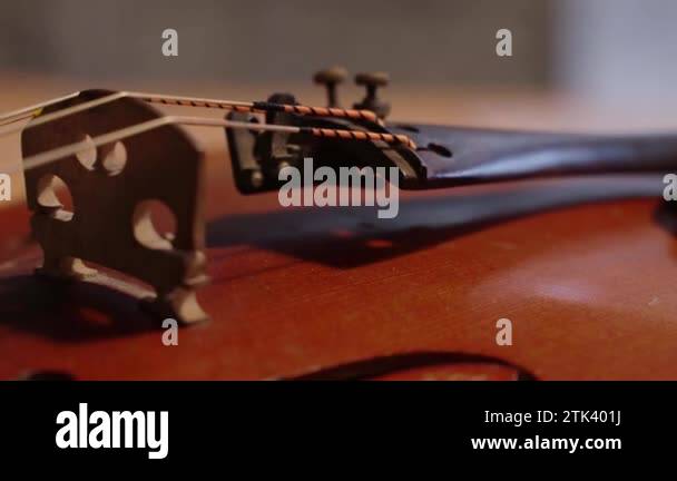violin lies on the sheet music on the table, Close up. String music ...