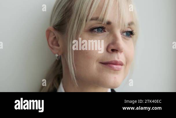 A smiling Caucasian businesswoman facing the camera. Her genuine smile ...